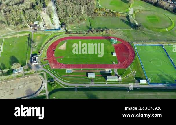 Track And Field Track Race Track 400 Meters Aerial Panning Down View ...