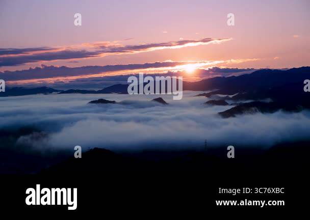 A breathtaking spring sunrise from Lion Head Mountain, Taiwan. The sun ...