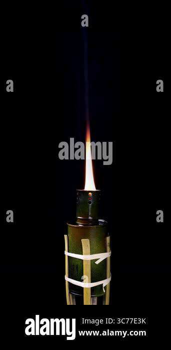Torch burning long flame on dark background Stock Video Footage - Alamy