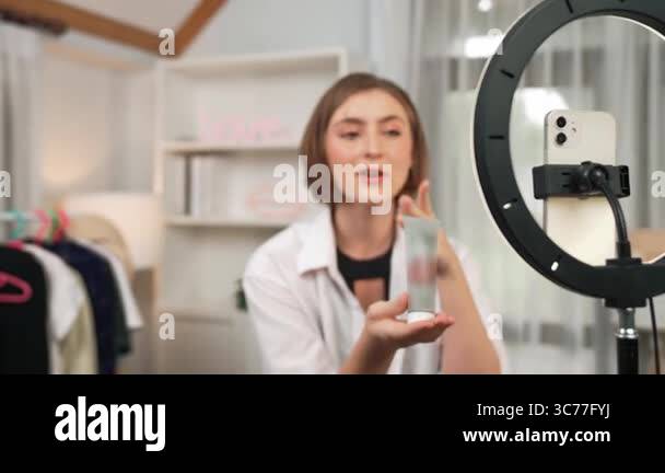 Woman influencer shoot live streaming vlog video review skincare for prim social media or blog ...