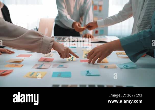 A dynamic creative meeting where team members engage in brainstorming ...