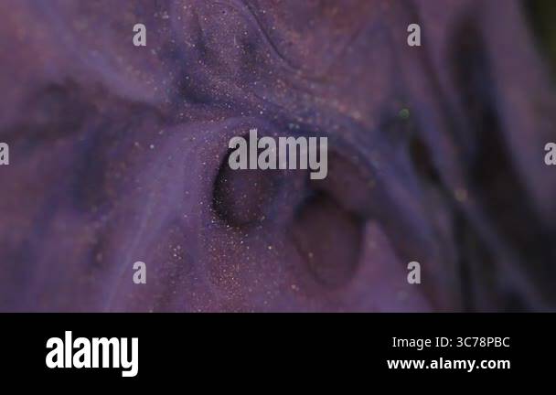 Blurred ink spill. Glitter fluid mix. Defocused purple color glowing ...