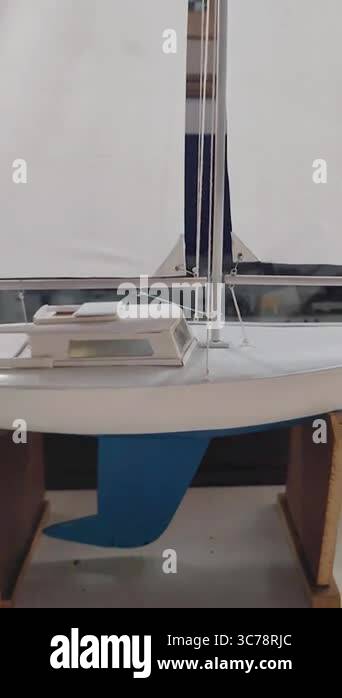 Dolly out video showing a wooden small-scale model crafted miniature of ...