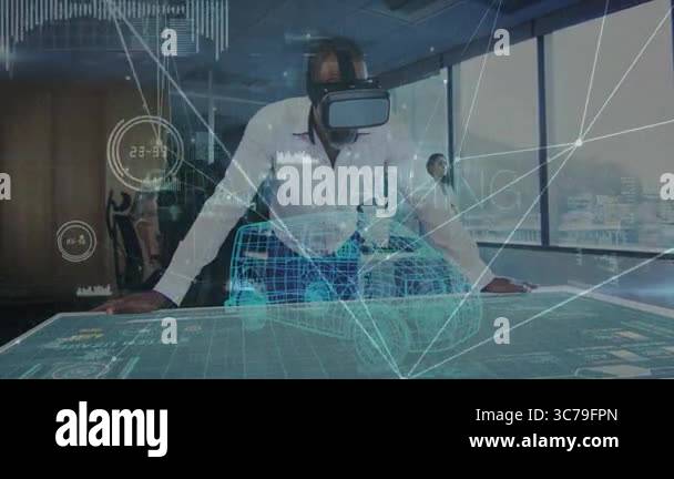Using virtual reality headset, man viewing animation of car design with ...