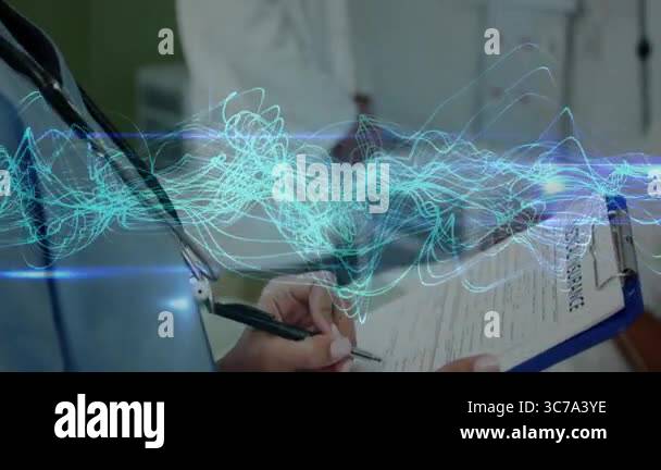 In hospital, medical professionals analyzing animation of complex data ...