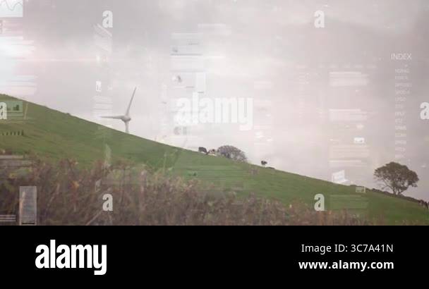 Wind turbine on grassy hill with data processing animation overlay ...
