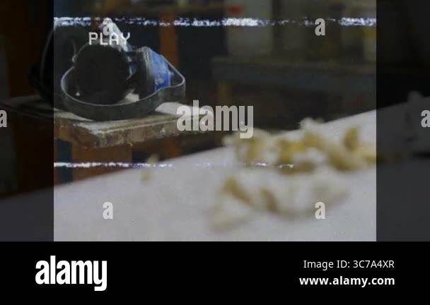 Shredded paper on table with animation of static lines and PLAY text ...