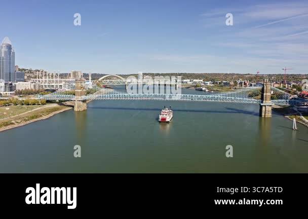 Aerial view of the Ohio River, the bridges and a cruise paddle boat in ...