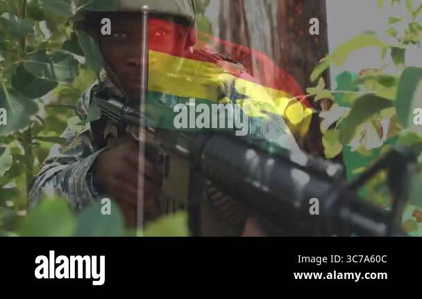 Aiming through foliage, soldier in jungle with Ghana flag animation ...