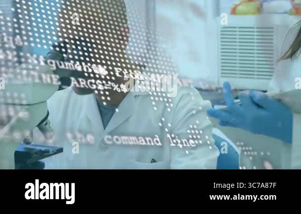 Examining data overlay, scientist working with microscope in laboratory ...