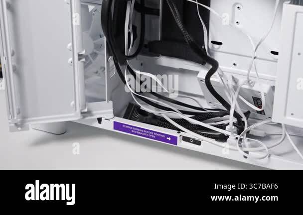 Interior of a white PC case showing organized cable management with ...