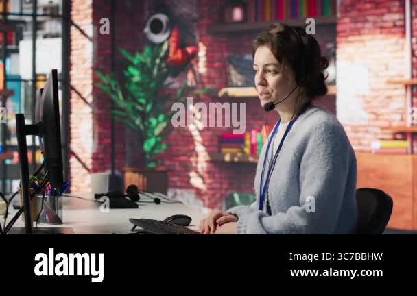 Call center employee handling customer complaints, assisting with ...
