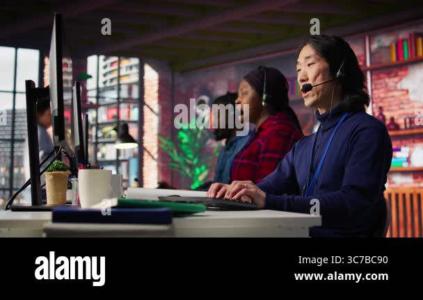 Call center admin team working together to provide live chat support ...