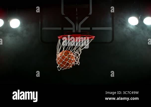 Super Slow Motion of Basketball Ball Hitting the Basket. Filmed on High ...