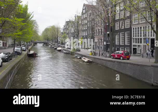 Amsterdam, Netherlands : The city on a cloudy spring day Stock Video ...