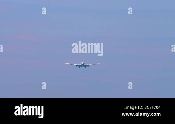 Cinematic footage of jet passenger plane approaching landing. Airliner ...