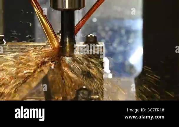 Pan scene the CNC milling machine rough cutting the mold parts with oil ...