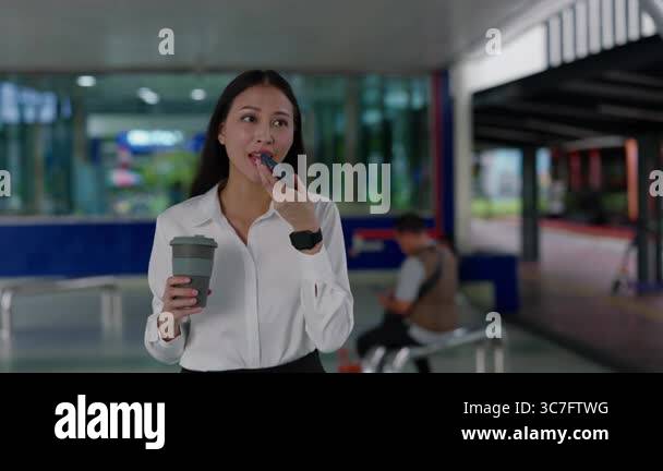 Charming Girl Going in Work Place Making Voice Message On Cell Phone ...
