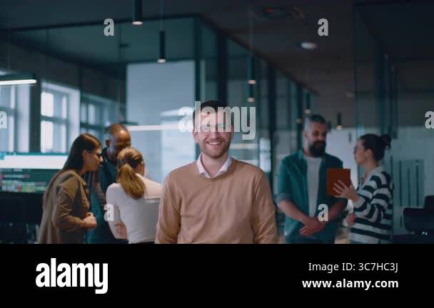 A successful business team working together in a modern startup office ...