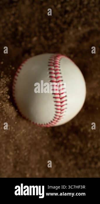 Super Slow Motion Detail Shot of Baseball Ball with Clay Explosion ...