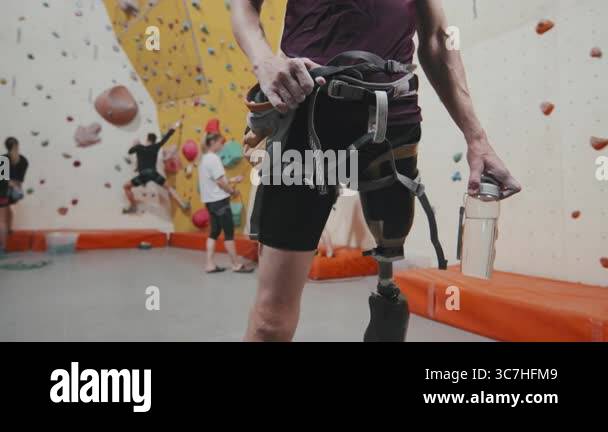 Midsection of unrecognizable athletic man with leg prosthesis wearing ...