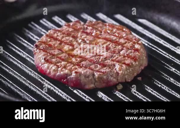 fresh ground beef burger meat on hot grill pan cooking, food closeup ...