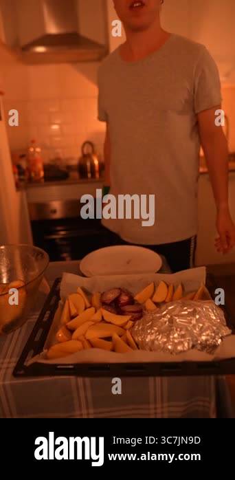 A skilled person joyfully cooks various foods, showcasing lively ...