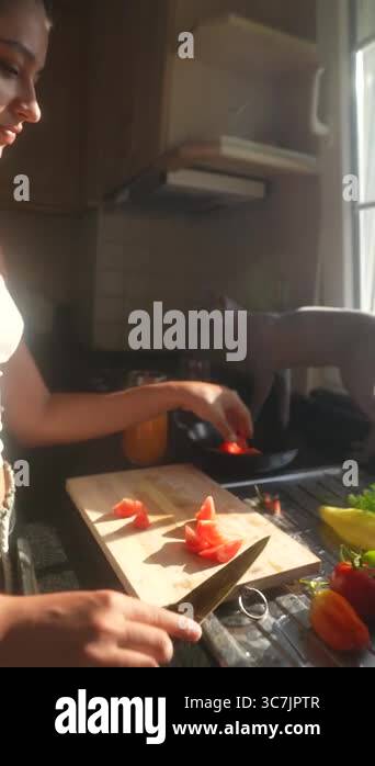 A vibrant and lively kitchen scene filled with fresh ingredients ...