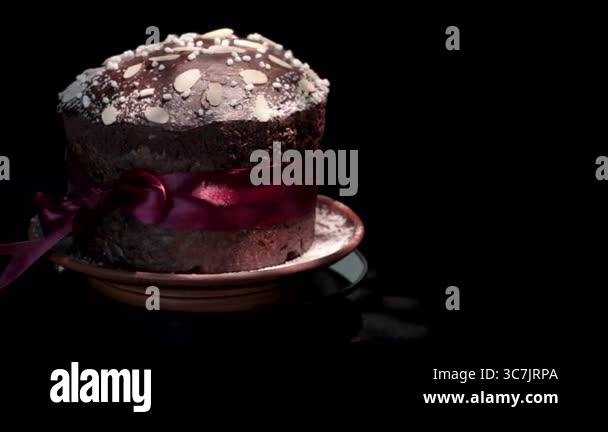 Panettone (Kulich, Paska) made of chocolate dough with decorations of ...