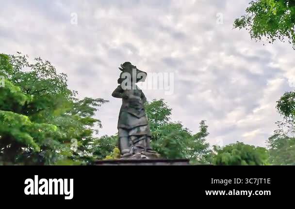 Lembu Suro Statue. He is a figure in folk legend who has a cow's head ...