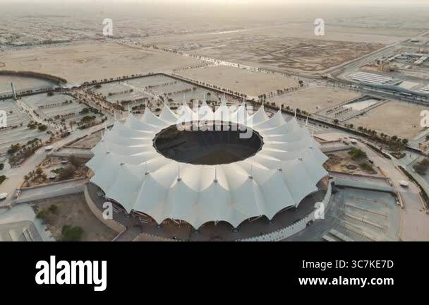 An aerial view of the sunrise of the Riyadh Stadium. A serene aerial ...
