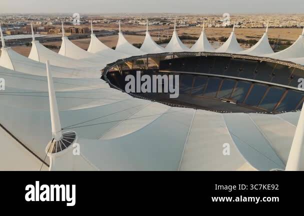An aerial view of the sunrise of the Riyadh Stadium. A serene aerial ...
