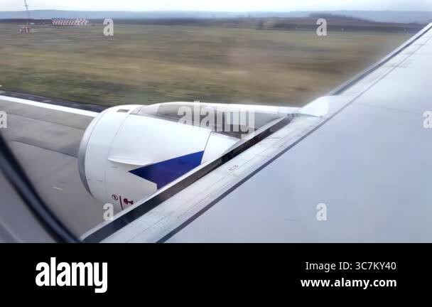 View from an airplane window of an airplane landing at the airport ...