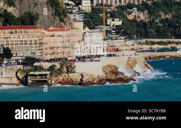 Nice, France - March 17, 2025: View of people walking on the coast of ...