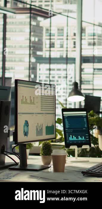 Vertical video Financial charts and KPI metrics on displays in office ...