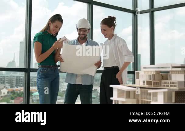 Professional architect engineer team thinking, sharing, brainstorming ...