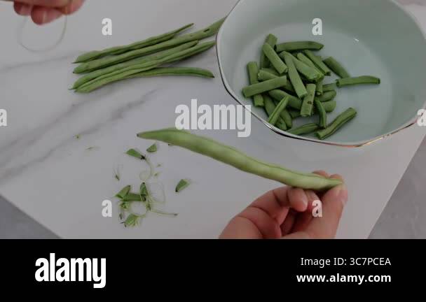 Hands Skillfully Folding Fresh Green Beans for dinner,Prepare dishes ...