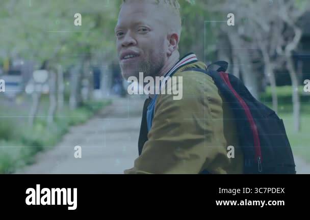 Smiling person with backpack walking outdoors, digital data overlay ...