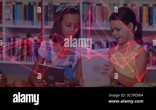 In school library, children using tablets with animation of digital ...