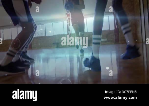 Basketball going through hoop with animation effects in school gym ...