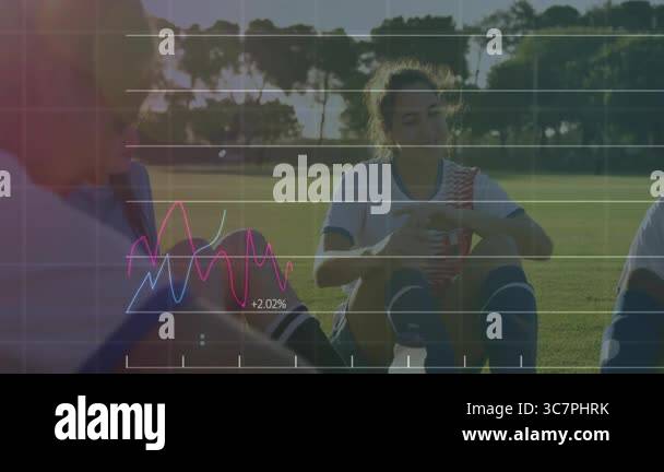 On grass, athletes discussing strategies with graph lines overlaying ...