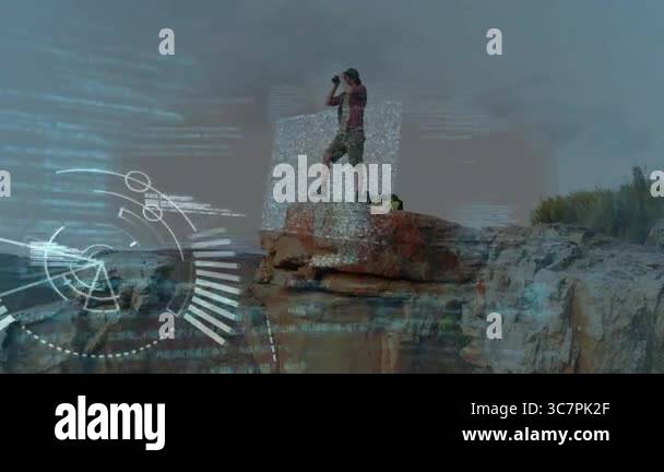 Person standing on cliff overlaid with typing hands on keyboard ...