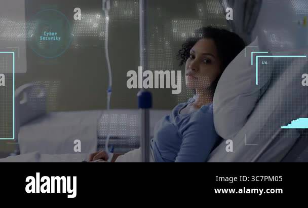 Patient in hospital bed with digital user profile overlay animation ...
