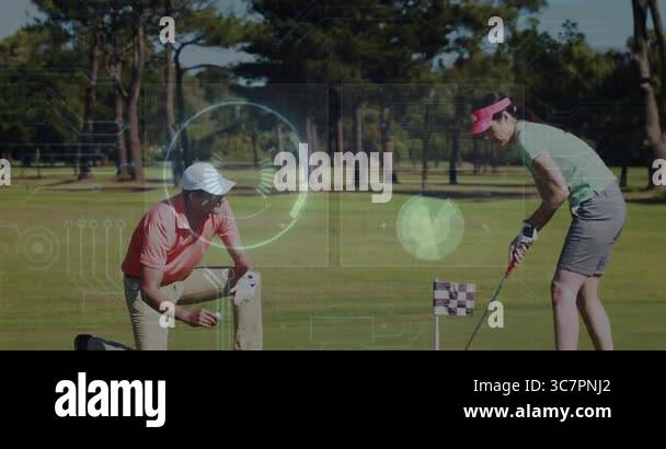 On golf course, golfer putting with animation of digital data overlay ...