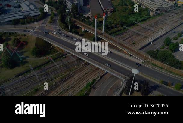 Busy highway intersecting railway tracks in urban area, animation of ...