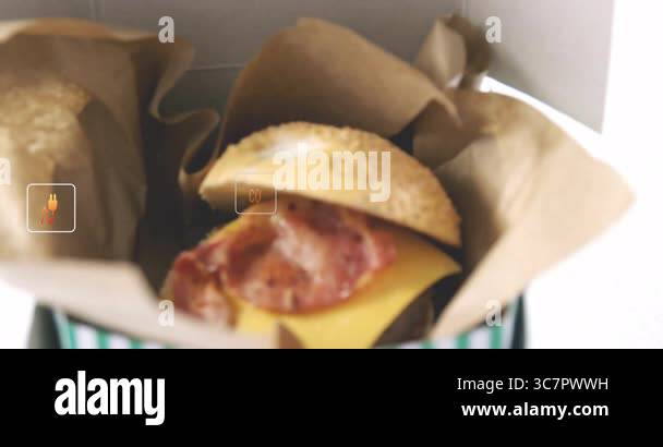 In school, animation of burger with cheese and bacon, digital data ...