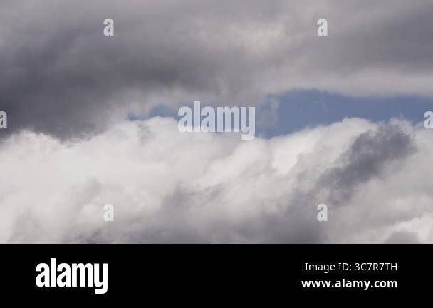 This timelapse video captures the dramatic gathering of dark storm ...