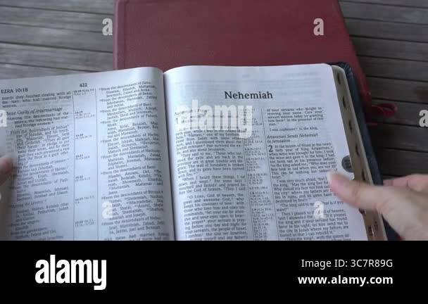 The book of Nehemiah in the Old Testament of the Holy Bible Stock Video ...