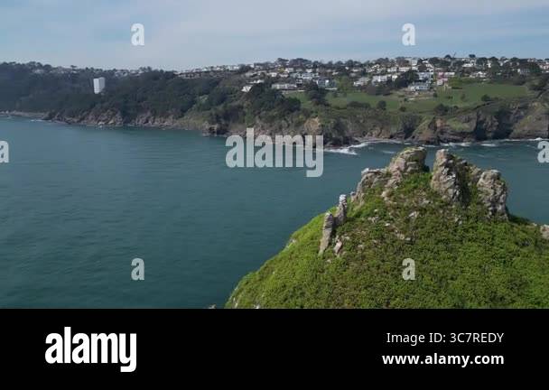 Torbay, South Devon, England: DRONE VIEWS: Thatcher Rock and the sea showing the mainland and ...