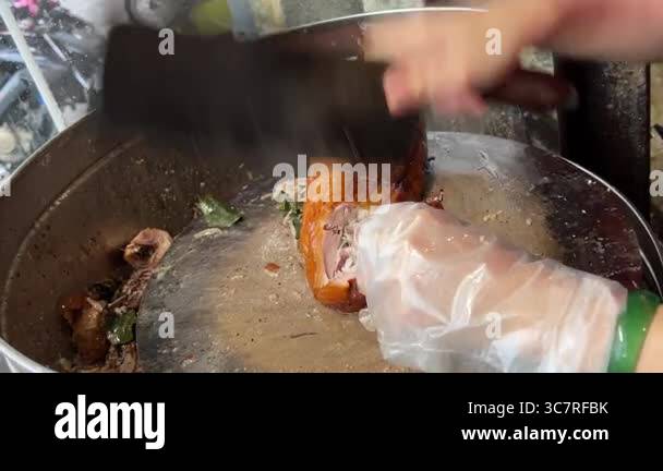 street food chop goose Close-up of slicing Chinese food Beijing roast ...